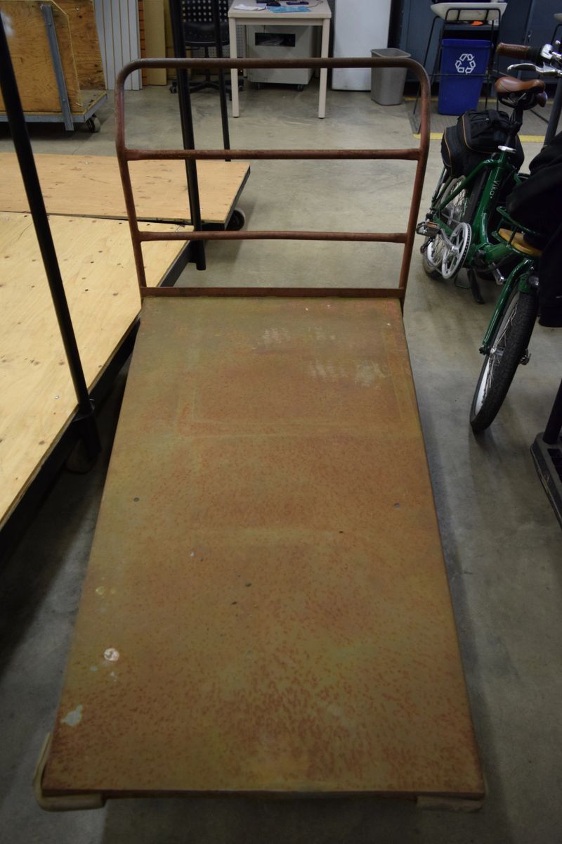 Vintage rail road cart with steel deck